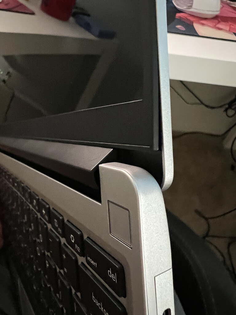 Bezel comes up on corner when opened fully - Framework Laptop 13 ...