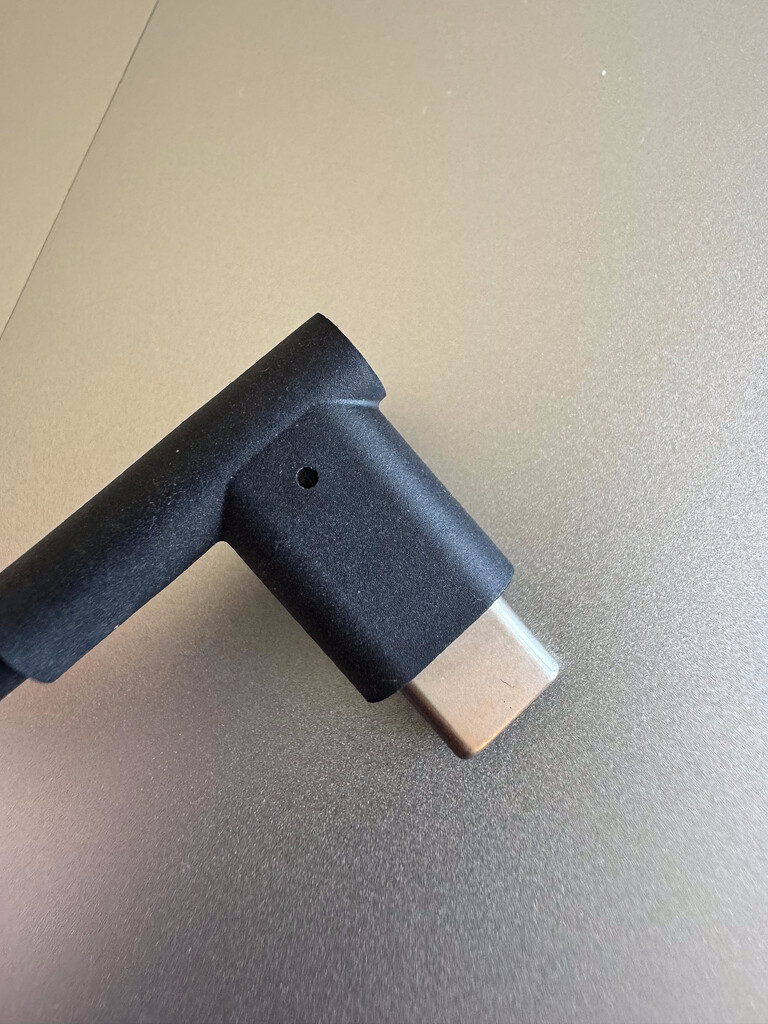 What is this small hole on the 180W FW16 Power Adapter's USB C connector? - Framework Laptop 16 ...