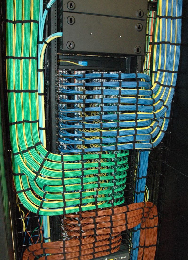 Organized network cabling on a wall for looks and performance ...